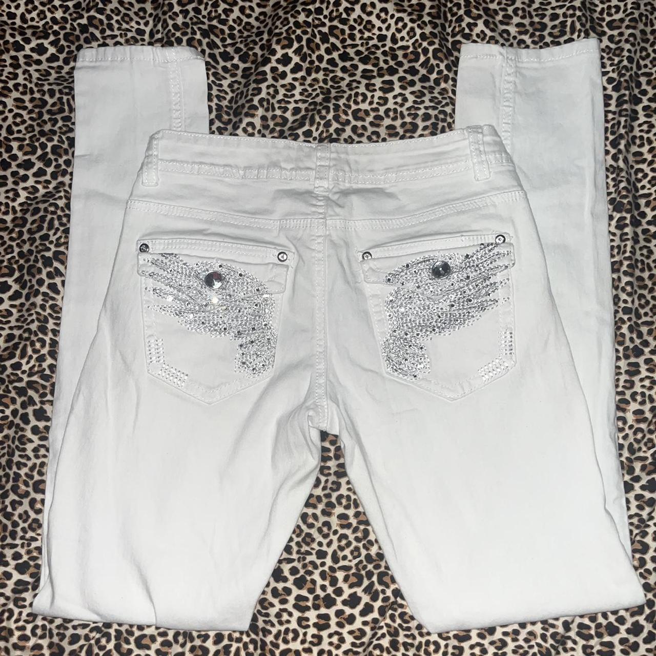 Angel wings on pocket white skinny jeans #cybery2k... - Depop