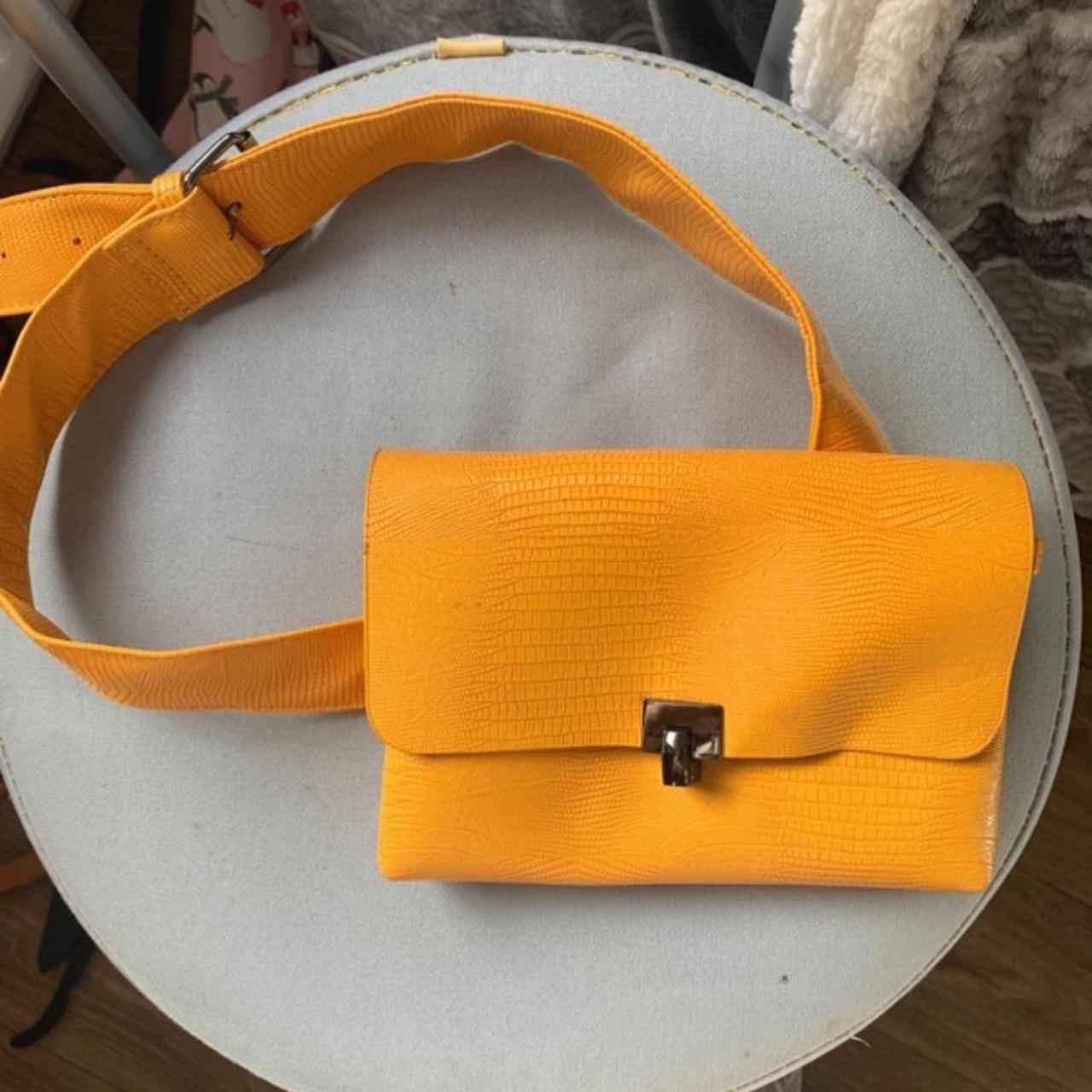 Bright orange faux leather bum bag with adjustable... - Depop