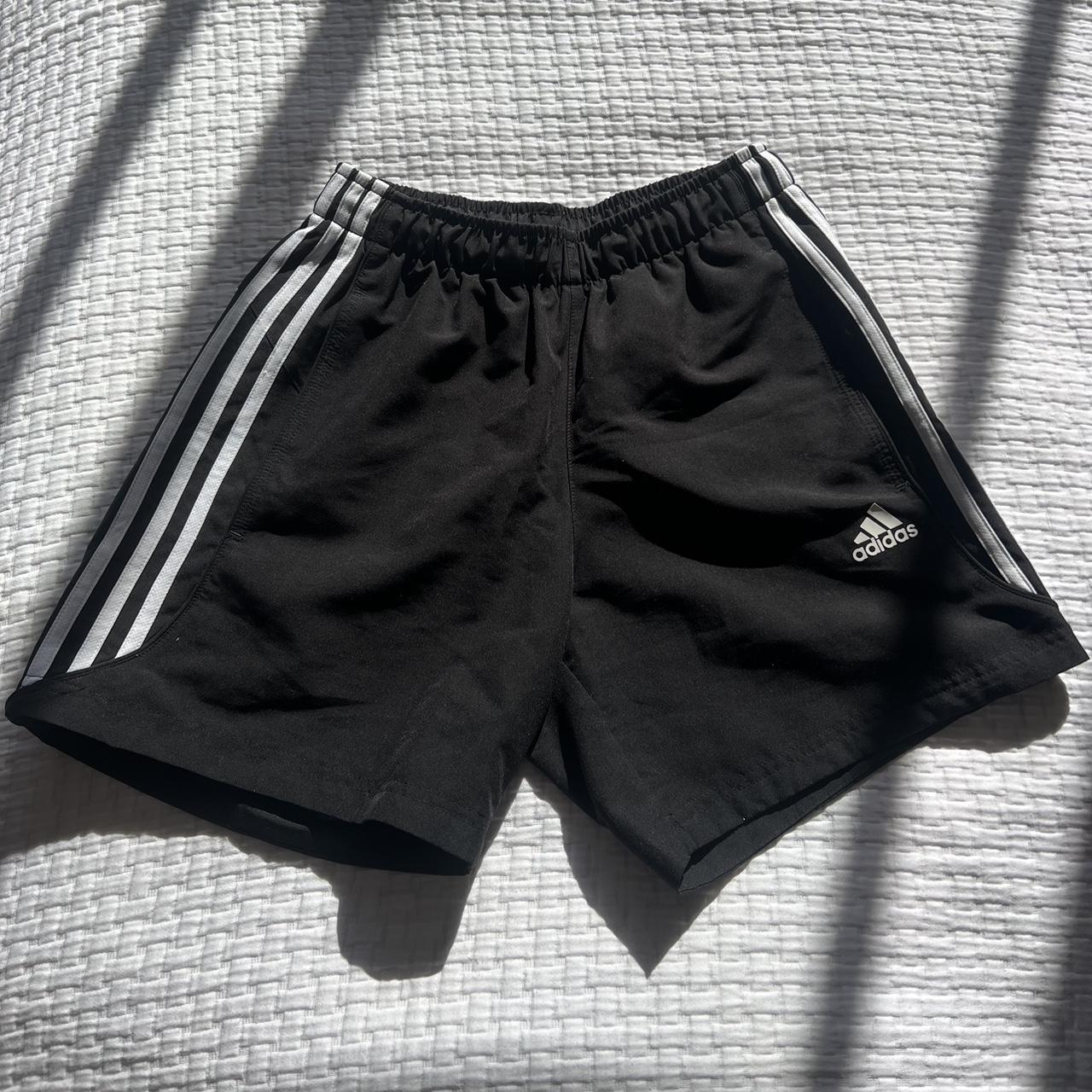 Adidas black shorts with white stripes Men’s size... - Depop