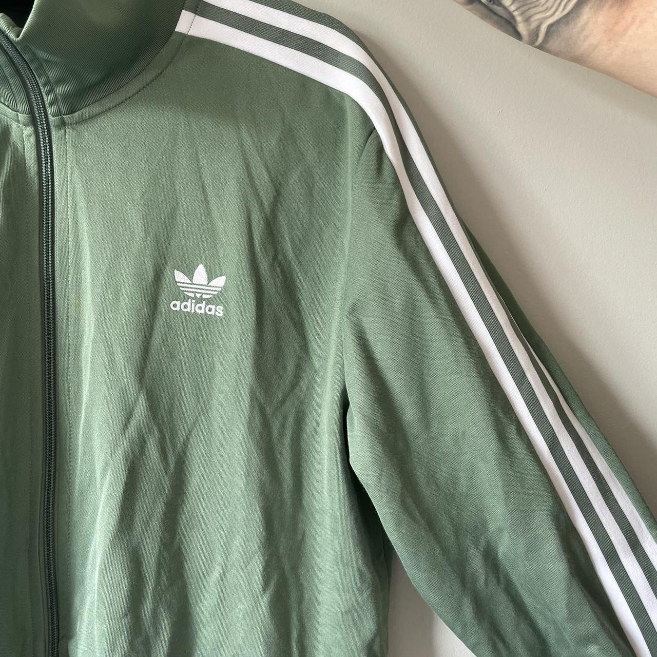 Adidas Originals men's sage green zip track top with... - Depop