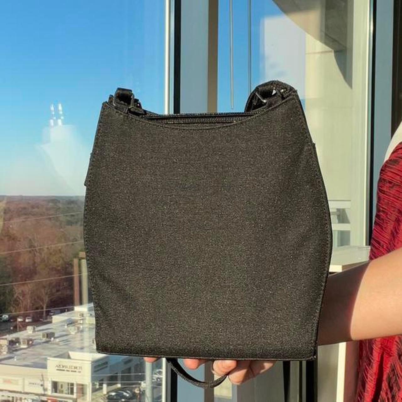 #200 Funky shaped black purse. Has enough room for a... - Depop