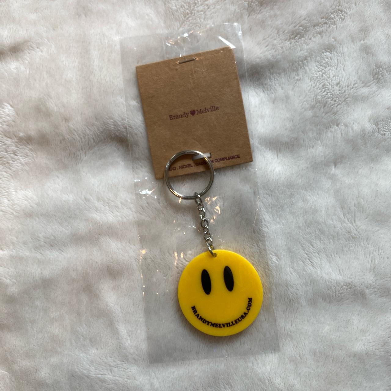 brandy melville smiley face keychain - Depop