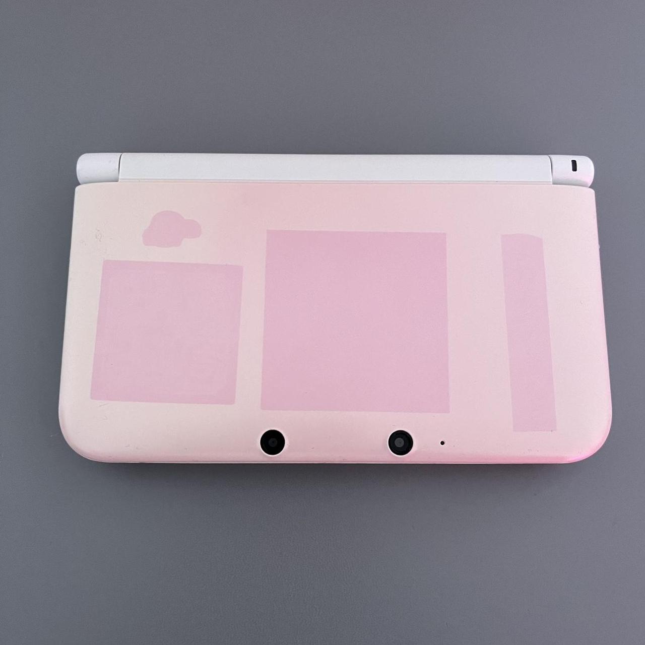 Pink Nintendo 3DS XL has marks on shell from... - Depop