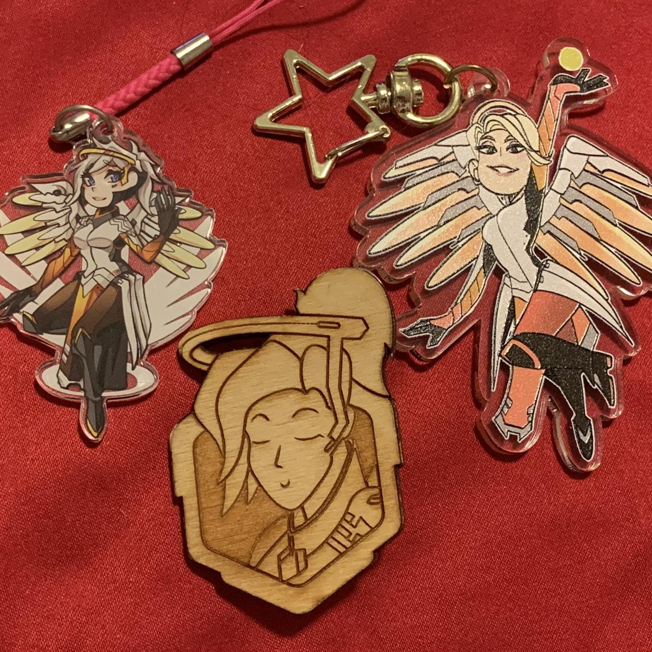 Keychains and Wooden Pin of Mercy from Overwatch - Depop