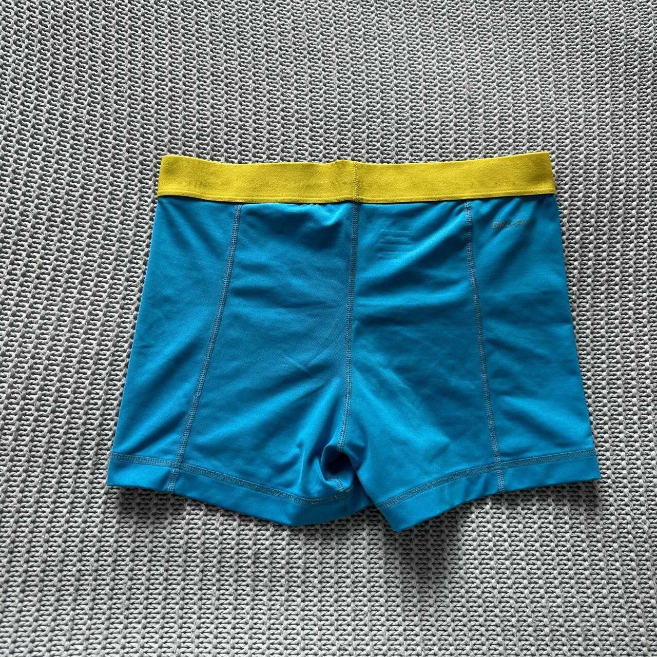nike pro shorts spandex bright blue and yellow... - Depop