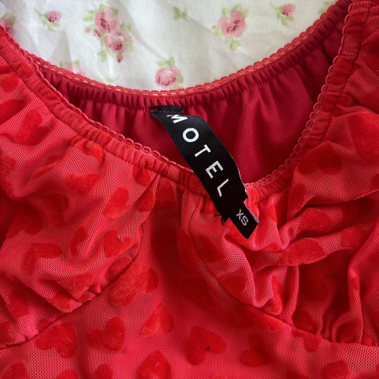 Motel Cuffed shoulder red heart top Hardly worn Size... - Depop