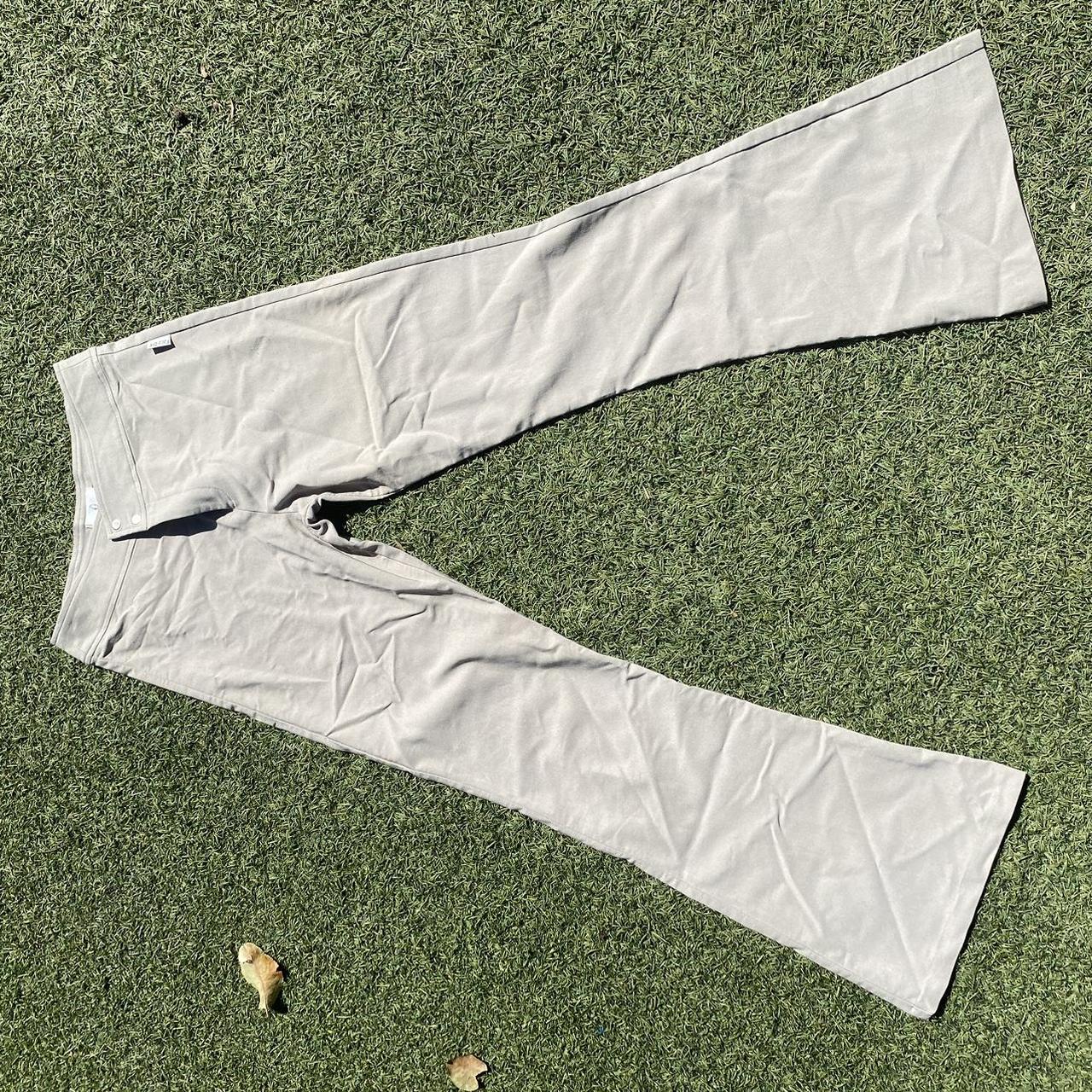 Coolest vintage face off flare nylon pants. - Depop