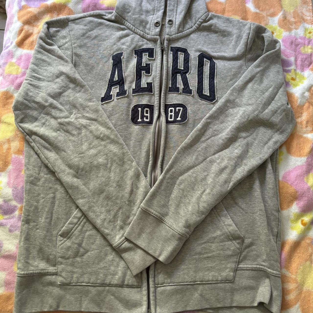 Aeropostale grey and navy lettering zip up hoodie.... - Depop