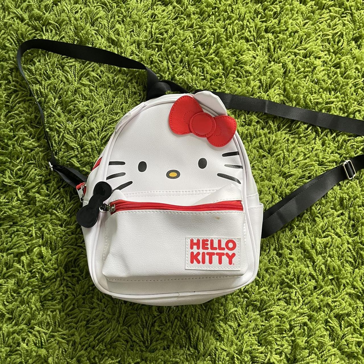 -Mini hello kitty backpack -small stain on the... - Depop