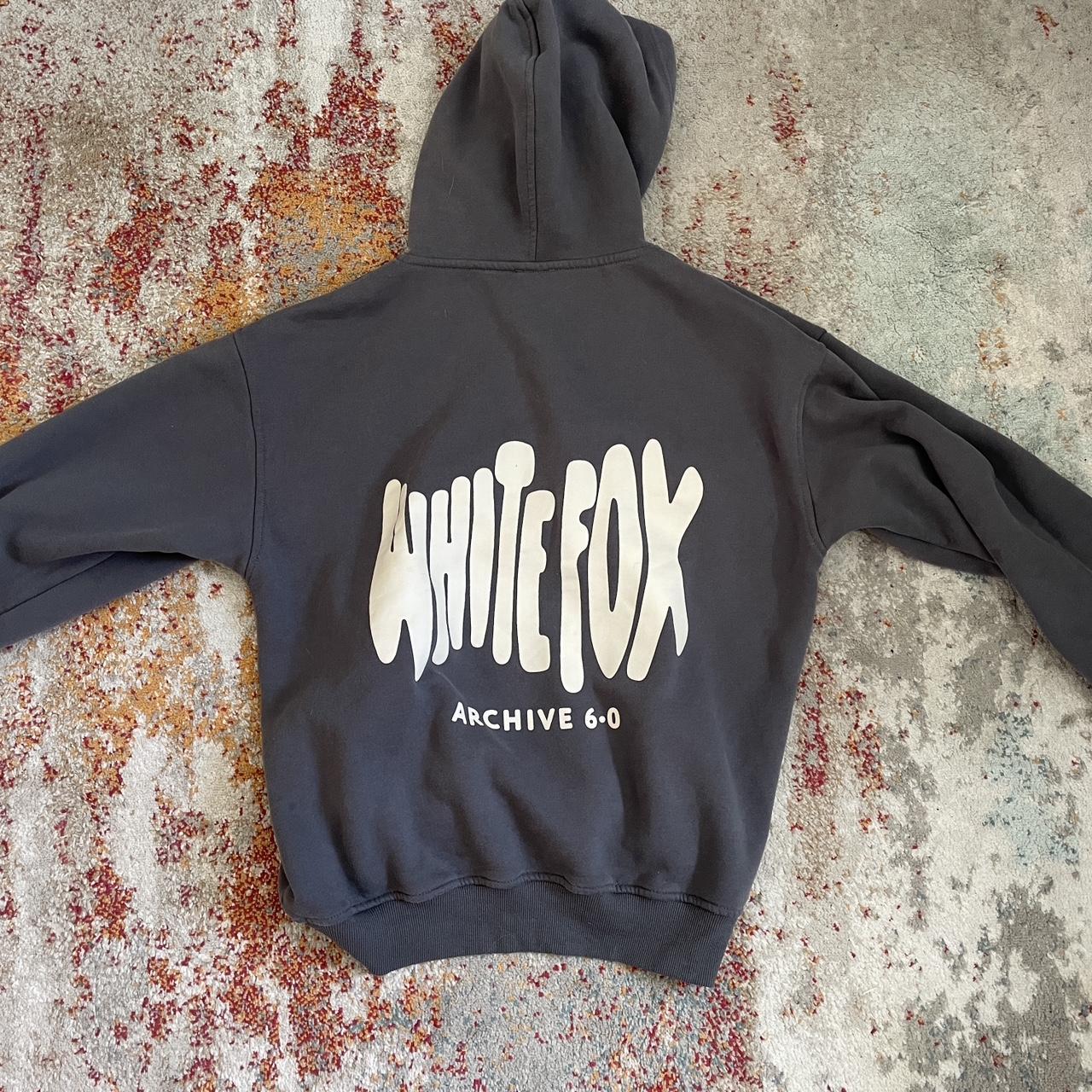 white fox hoodie worn quite abit the smallest mark... - Depop