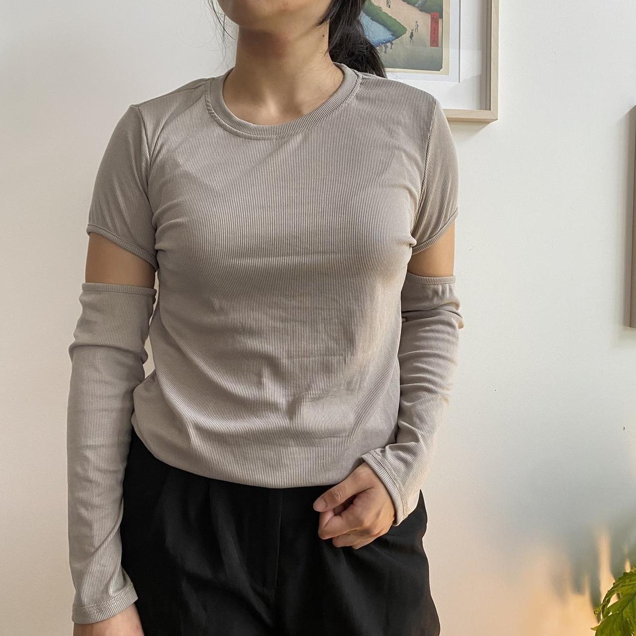 DAZY long sleeve grey top with arm cutouts Size XL... - Depop
