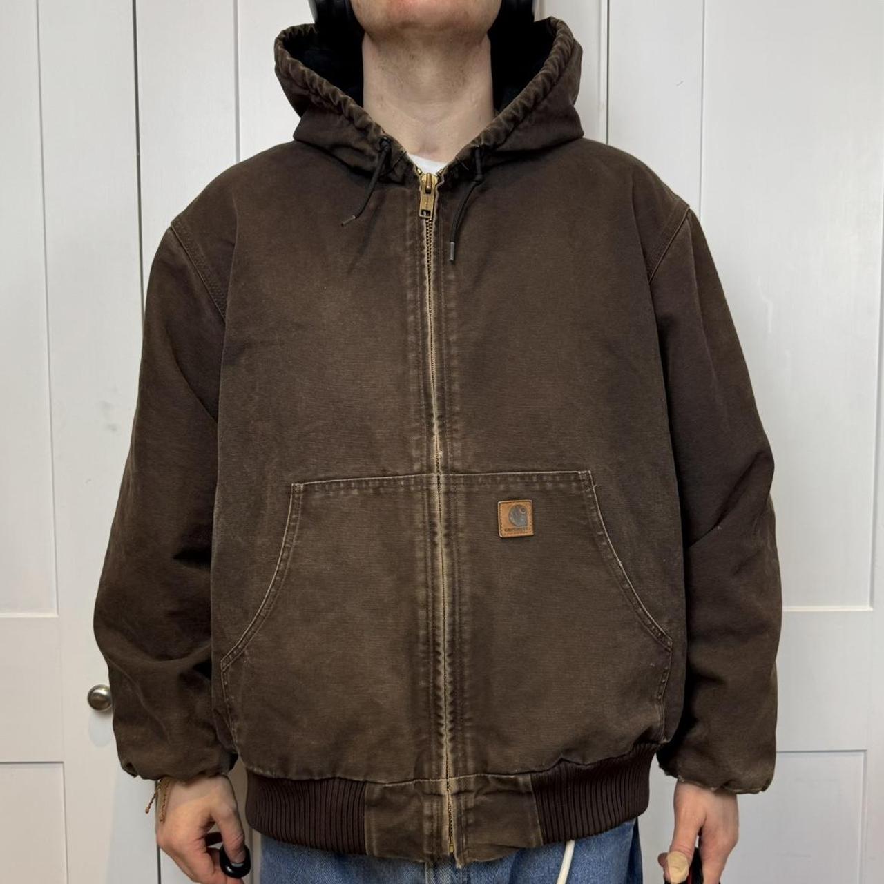 Carhartt J130 DKB hooded active jacket in dark... | Depop