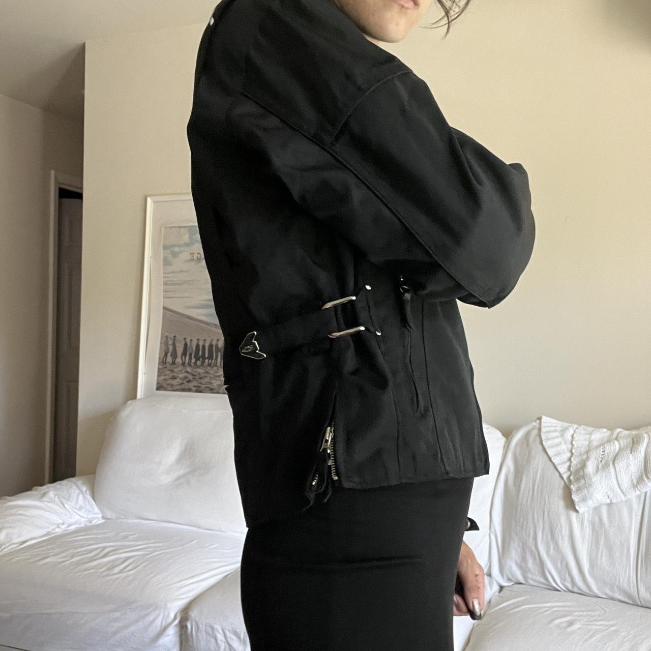 Black motorcycle jacket with a zipper in the front... - Depop