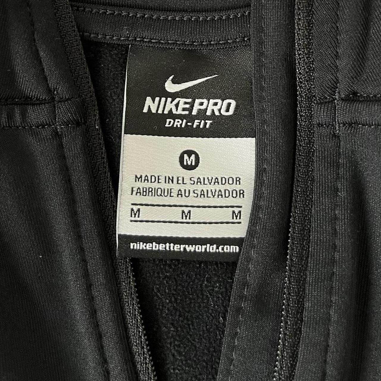 Nike pro dri-fit black zip up top size M shown on... - Depop