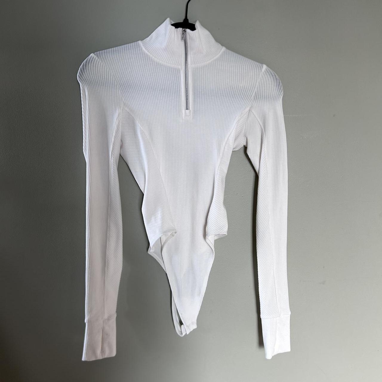 Like new alo body suit - Depop