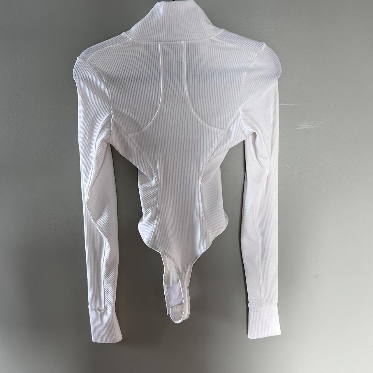 Like new alo body suit - Depop