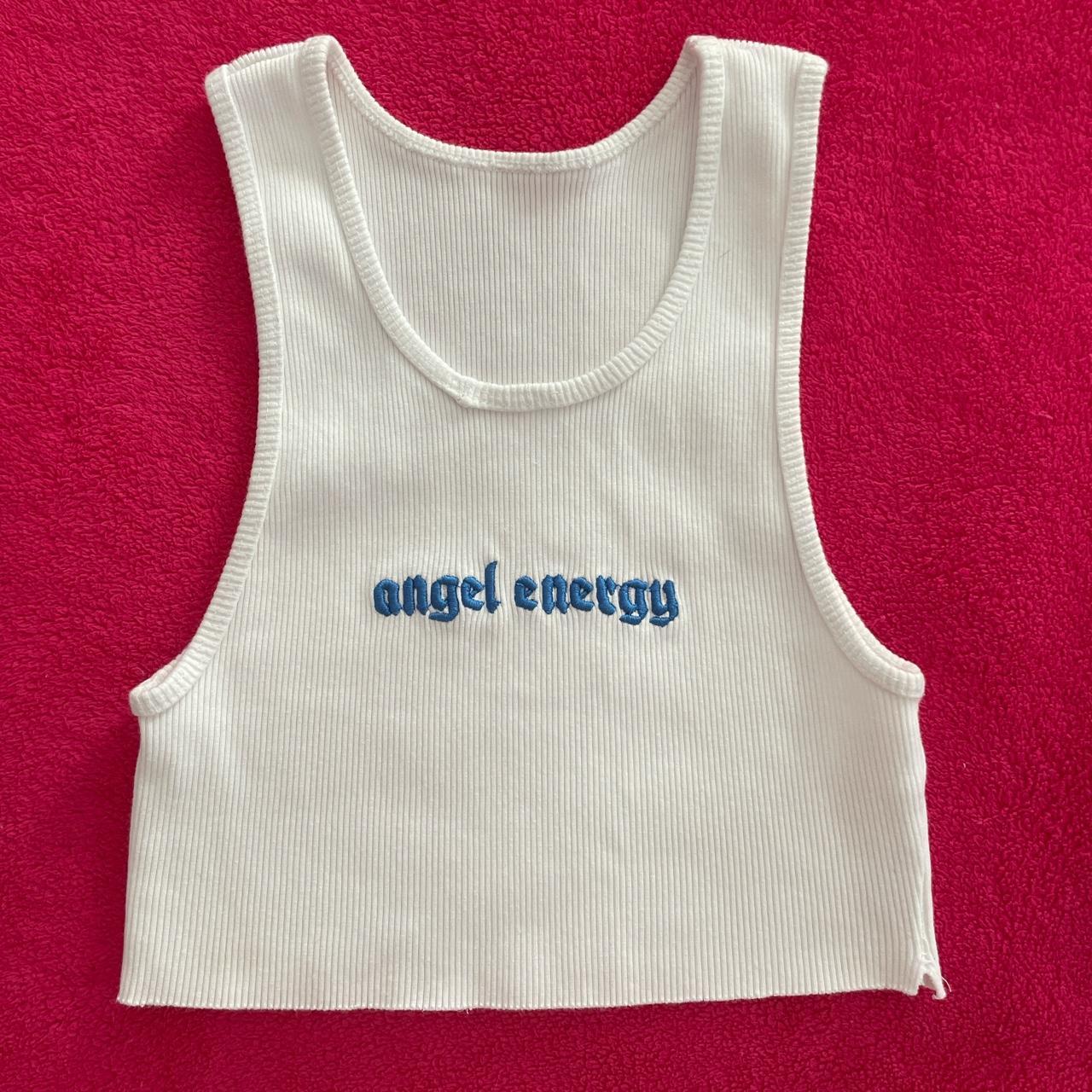 Adorable angel energy crop top from Revice!! Size... - Depop