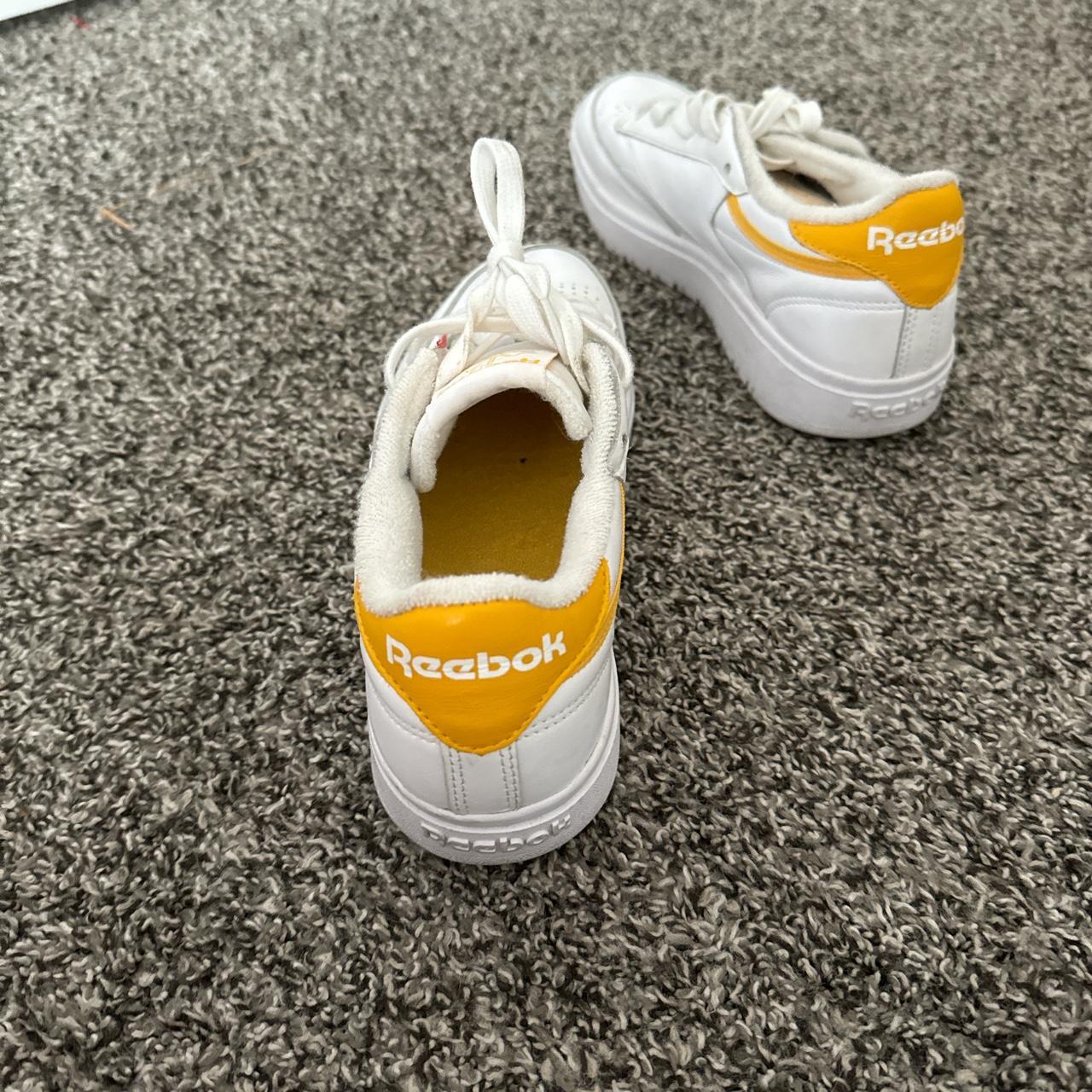 reebok yellow and white sneaker, has some fleece... - Depop