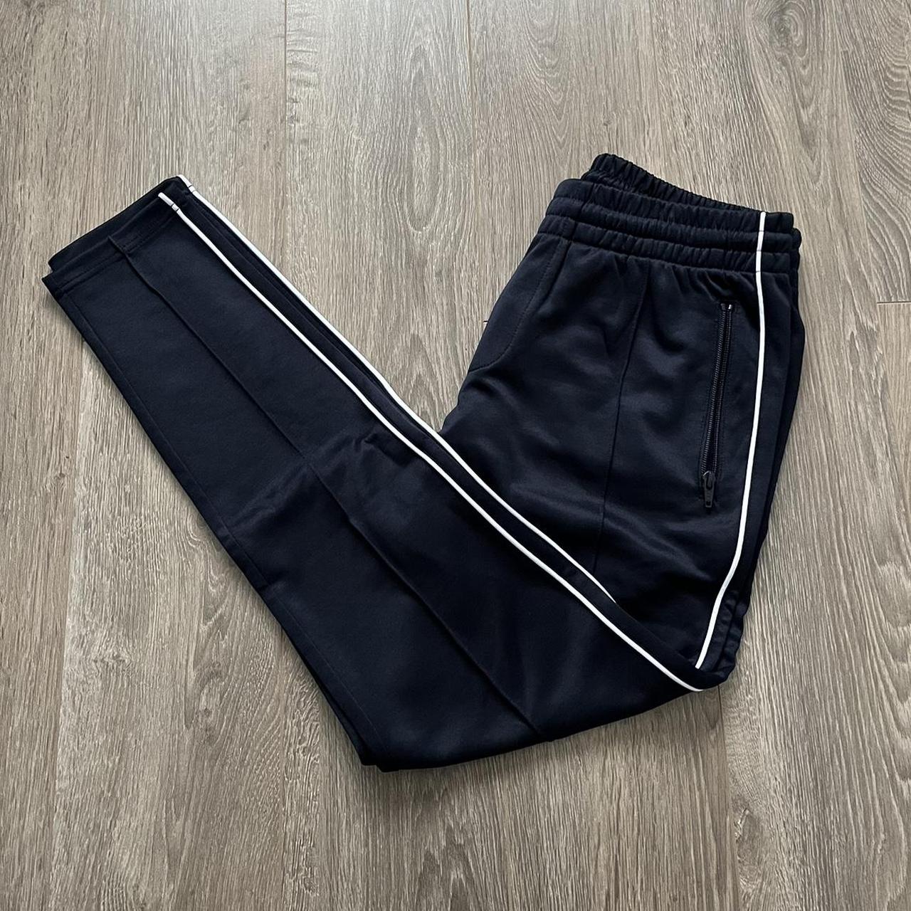 Arne Clo - Navy track pants with piping Size -... - Depop