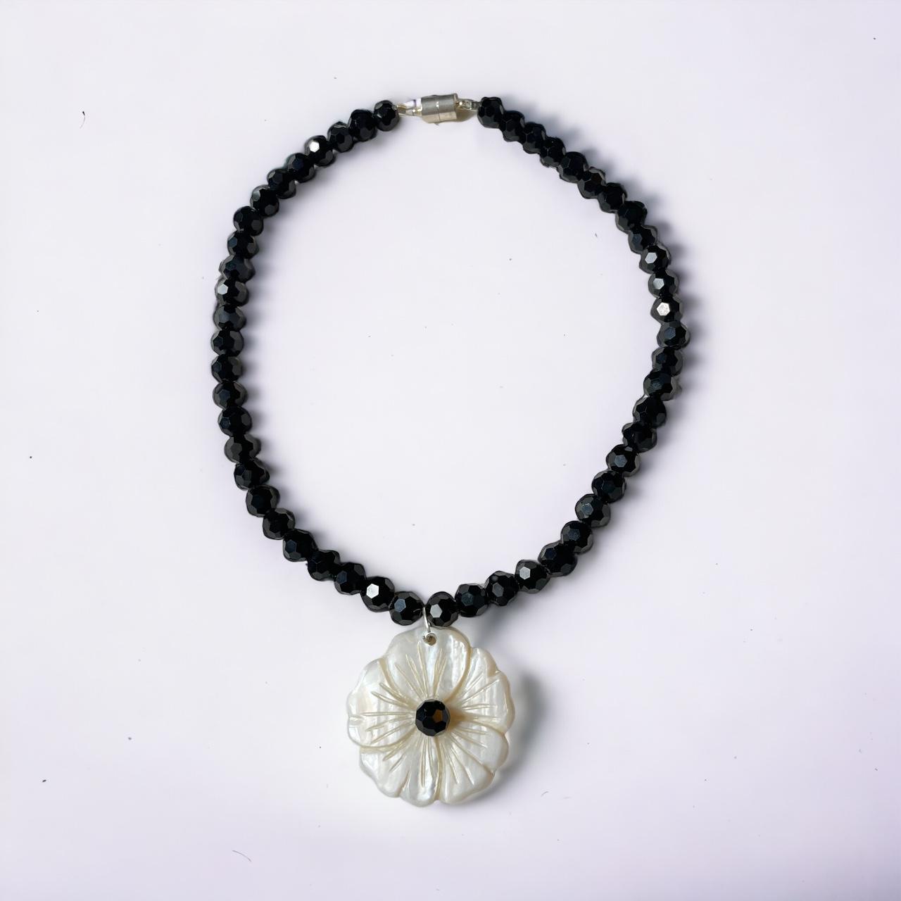 The Mother of Pearl Necklace in Black by Bleeding... - Depop
