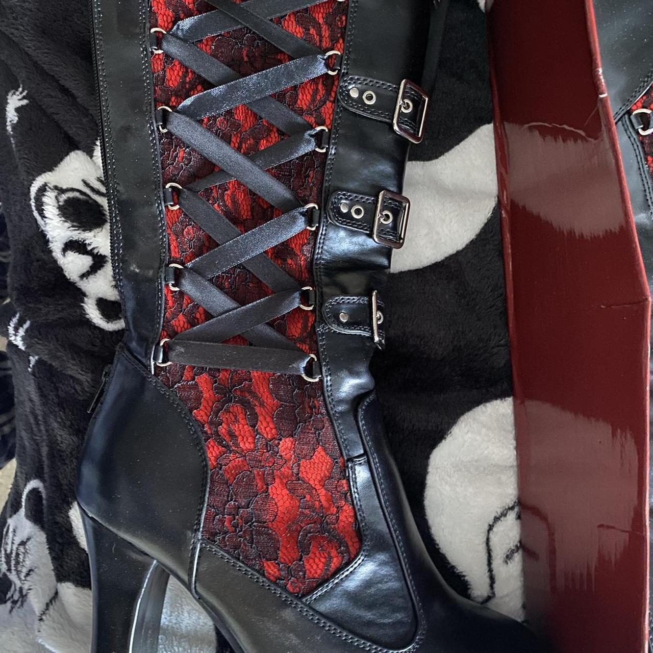 Demonia Women's Black and Red Boots | Depop