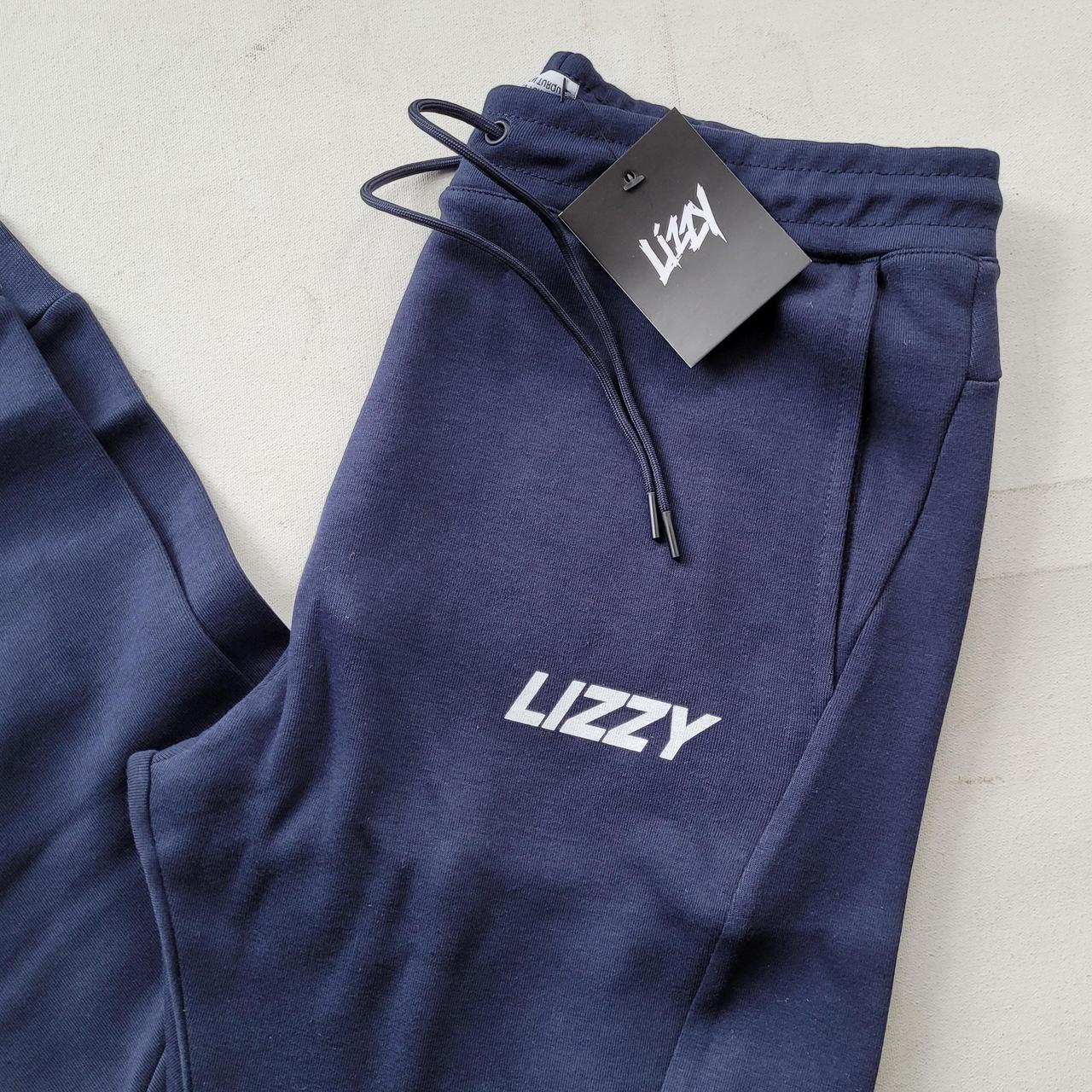 navy blue Lizzy road tech jogger bottoms. medium... - Depop