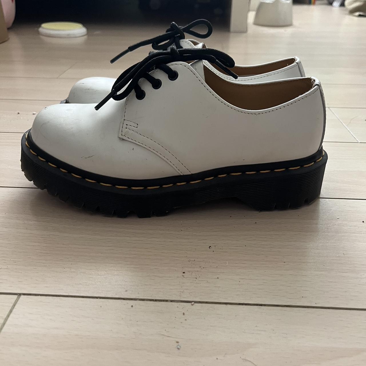white low top docs size 5, just some minor scuffing... - Depop