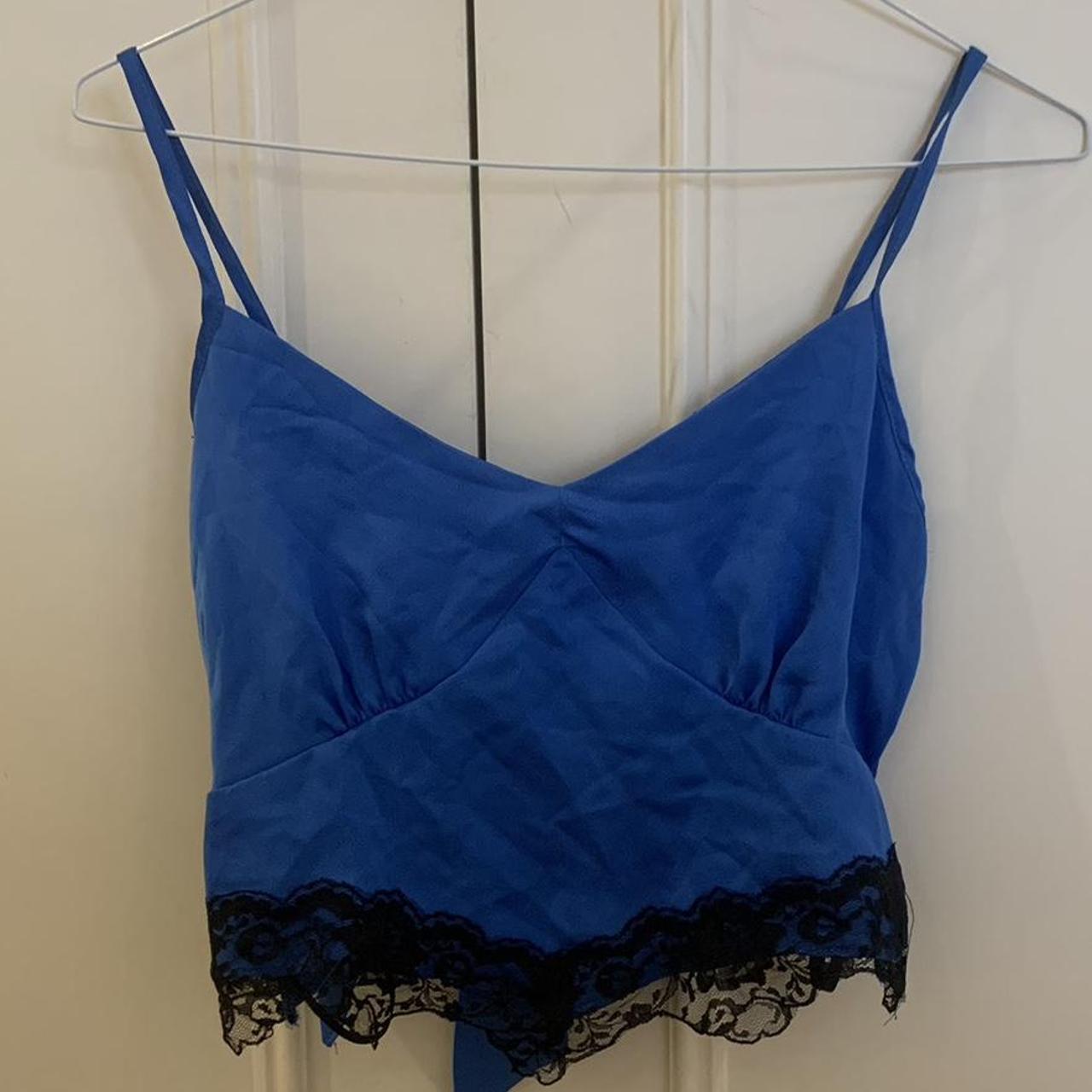 Blue silk spaghetti strap top. Bow tie up detail on... - Depop