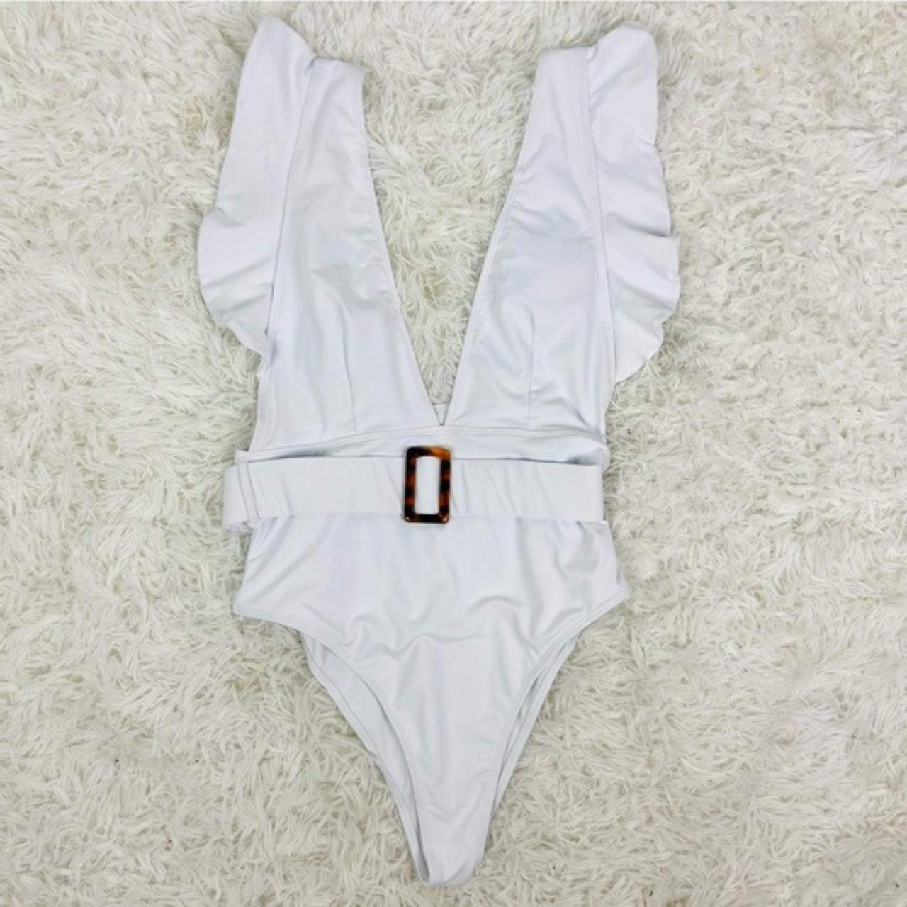 White One Piece Deep V Neck Ruffle Sleeve High Cut Depop