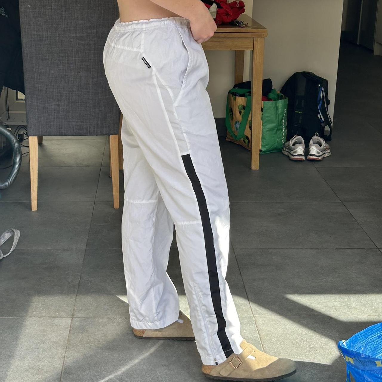 Nike White Trackies with black stripe and drawstring... - Depop