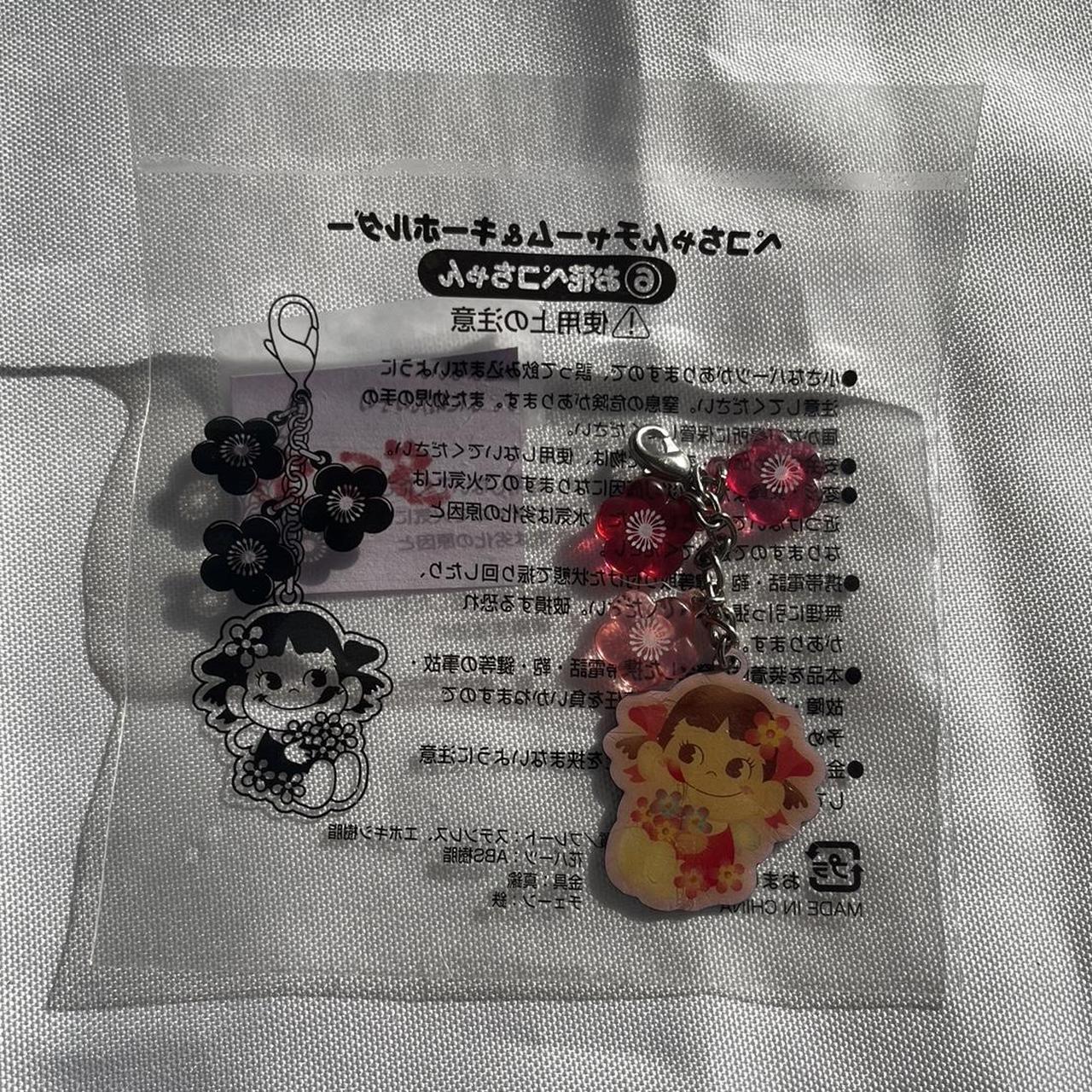 Rare Flower Peko Chan Keychain This cute keychain... - Depop