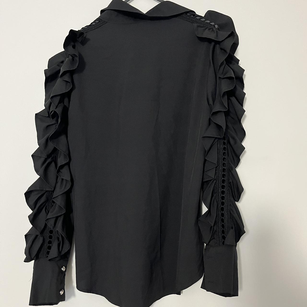 Black ruffle shirt bought in a boutique in... - Depop