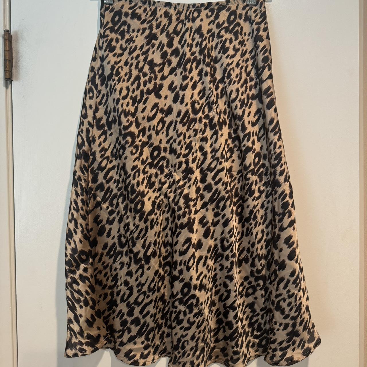 Leopard print midi skirt satin feel, snag in the... - Depop