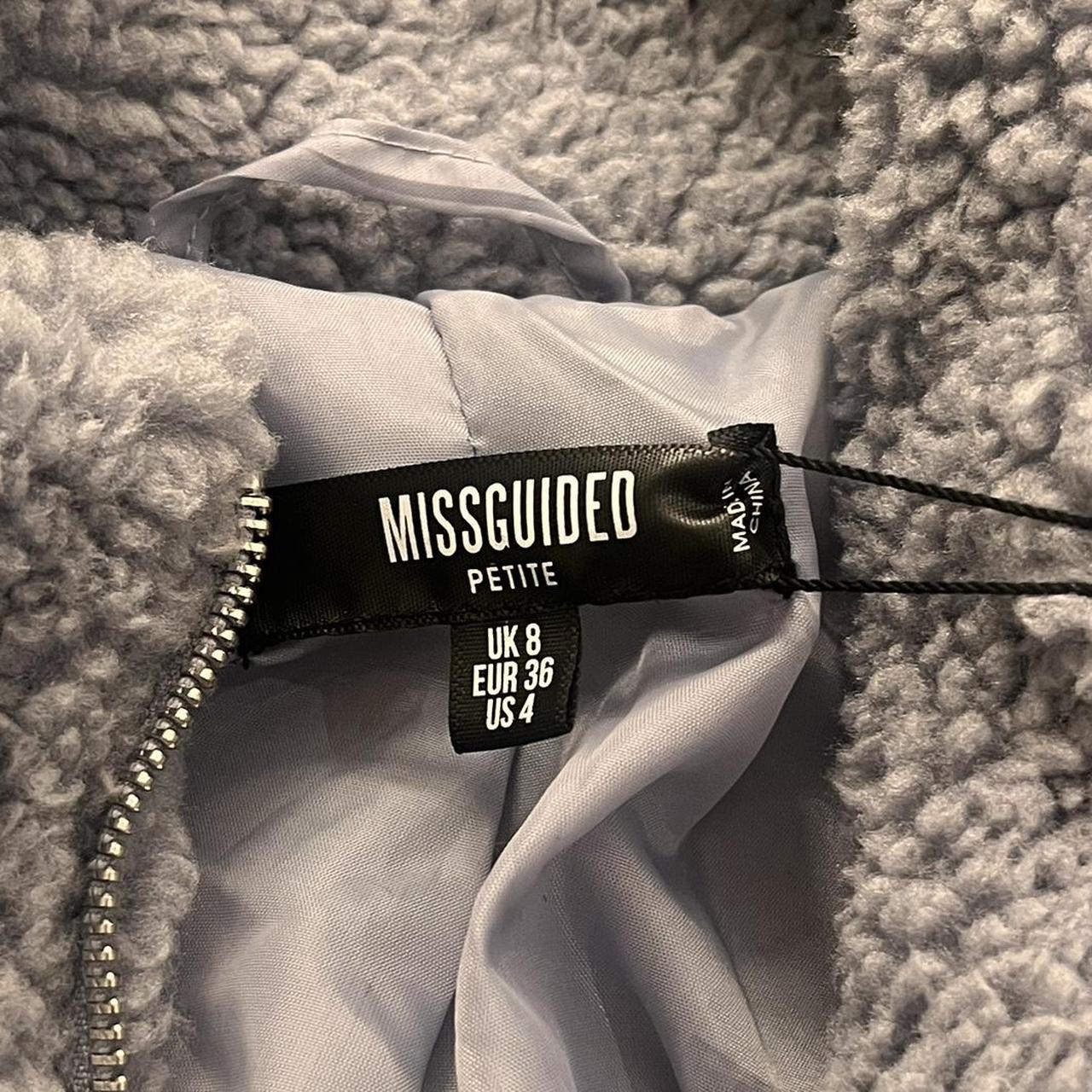 Blue fluffy jacket | Missguided Size 8 Petite, fits... - Depop