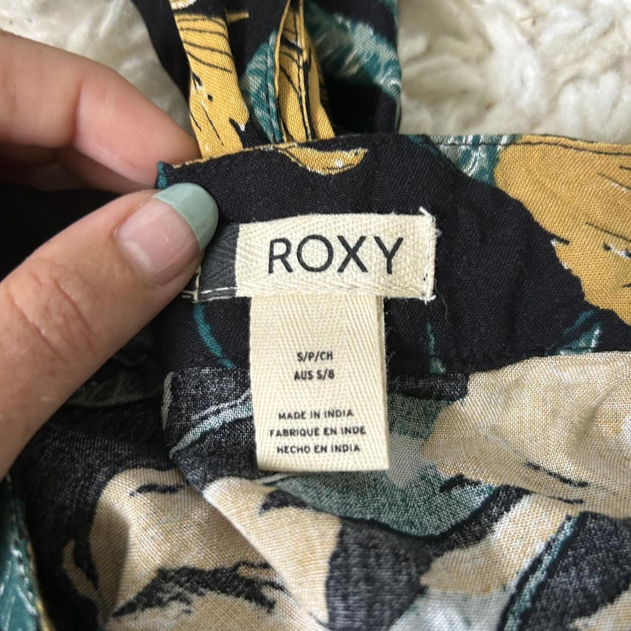 Roxy skirt with ruffle detail and tie back detail.... - Depop