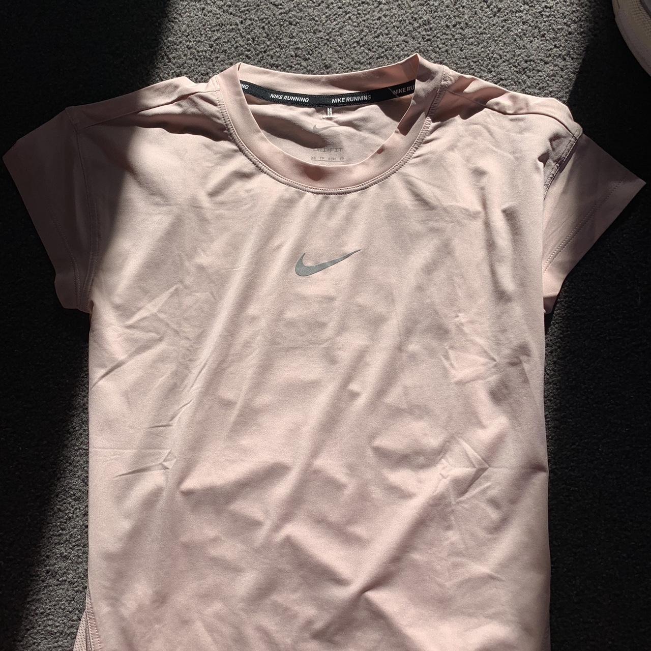 Light pink Nike running top! Only worn once or... - Depop
