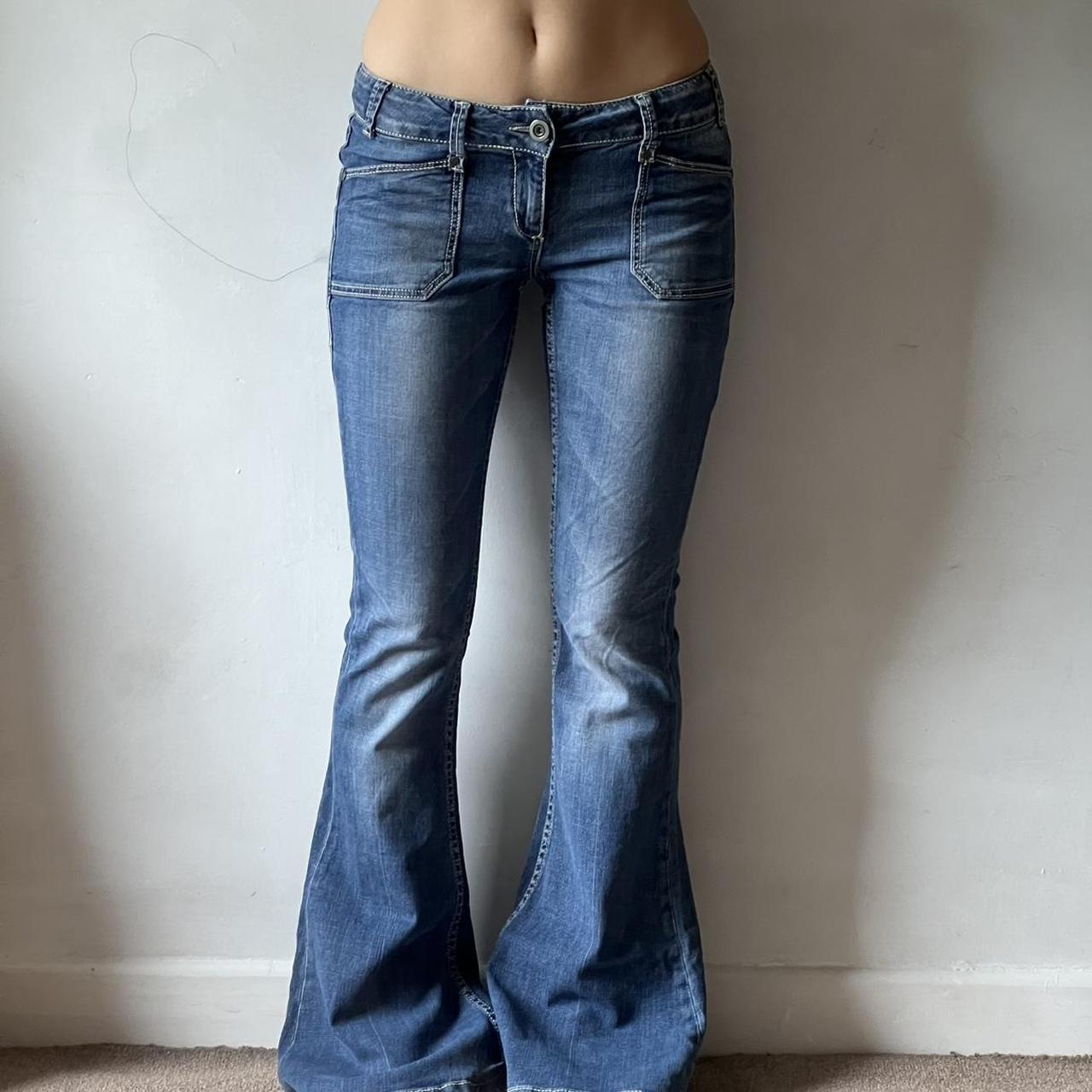 Low rise 2000s flare jeans mid wash bell bottom... | Depop