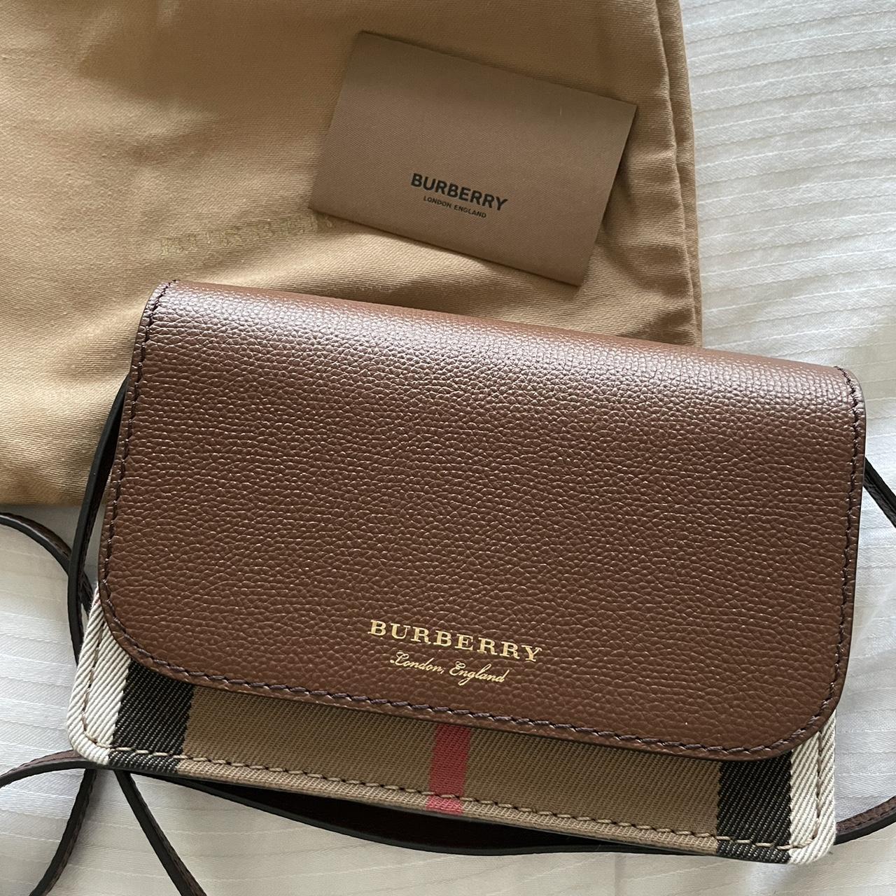 Authentic Burberry wallet on chain. Material is... - Depop