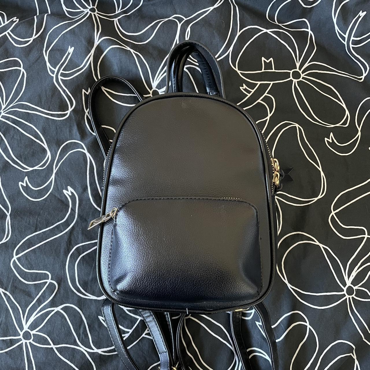 Small black backpack with 2 pockets Surprisingly can... - Depop