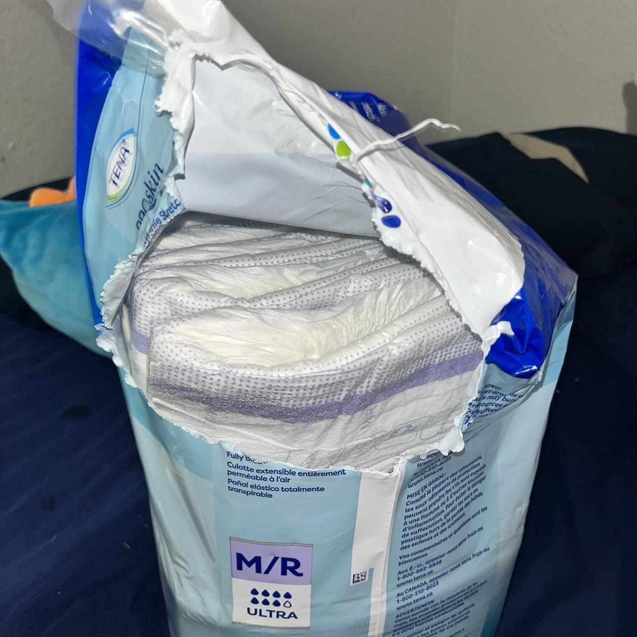 Tena ultra stretch diapers Open pack, about 32 left... - Depop