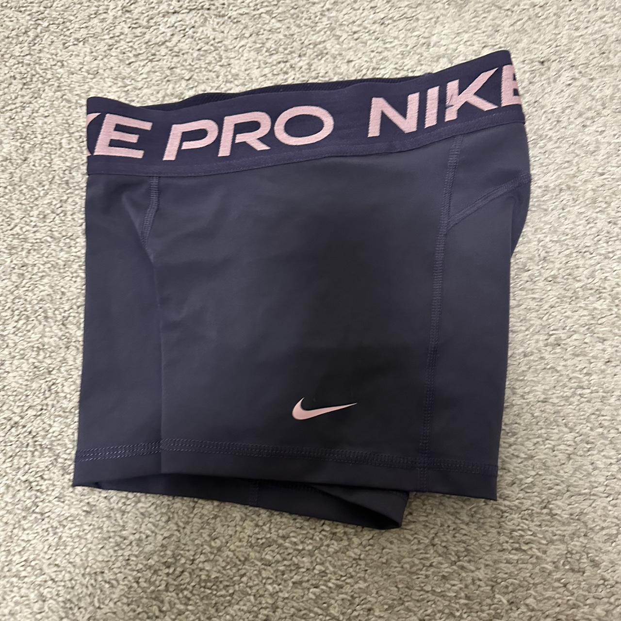 Purple and pink Nike pros! Worn once! #nikepros... - Depop