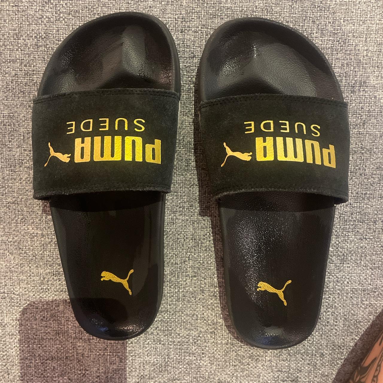 Puma slides - gold and black Excellent condition... - Depop