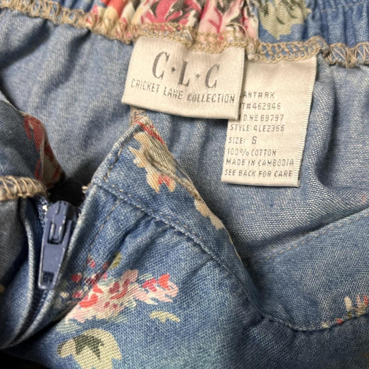 Vintage denim skort with a dusty pink floral pattern... - Depop