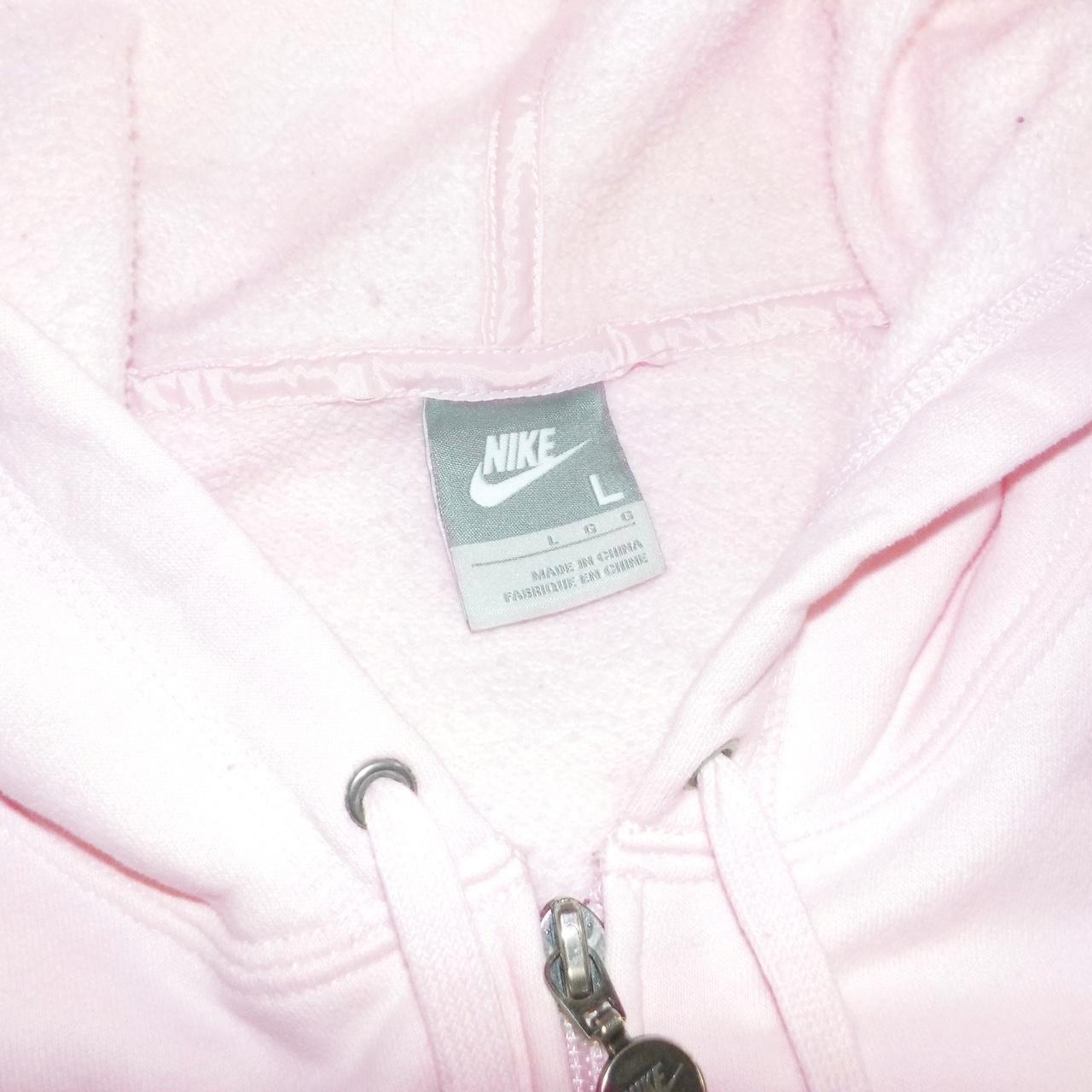 Vintage baby pink nike jacket size L but fits a size S - Depop