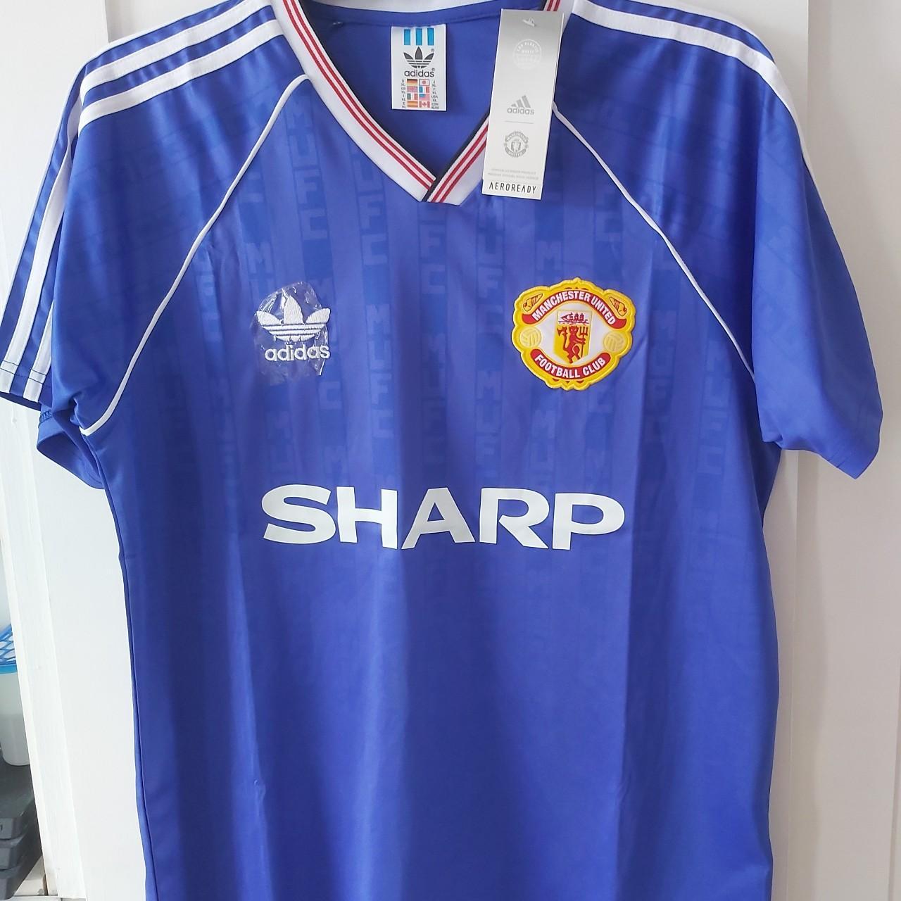 Manchester united adidas originals x re release. ... - Depop
