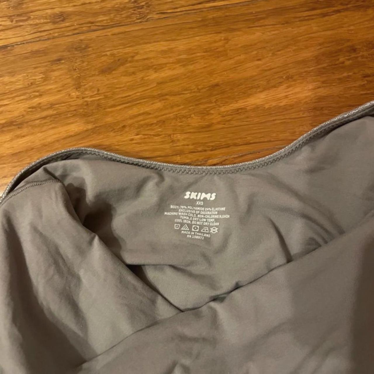 Skims silver metallic bodysuit. Super cute and never... - Depop