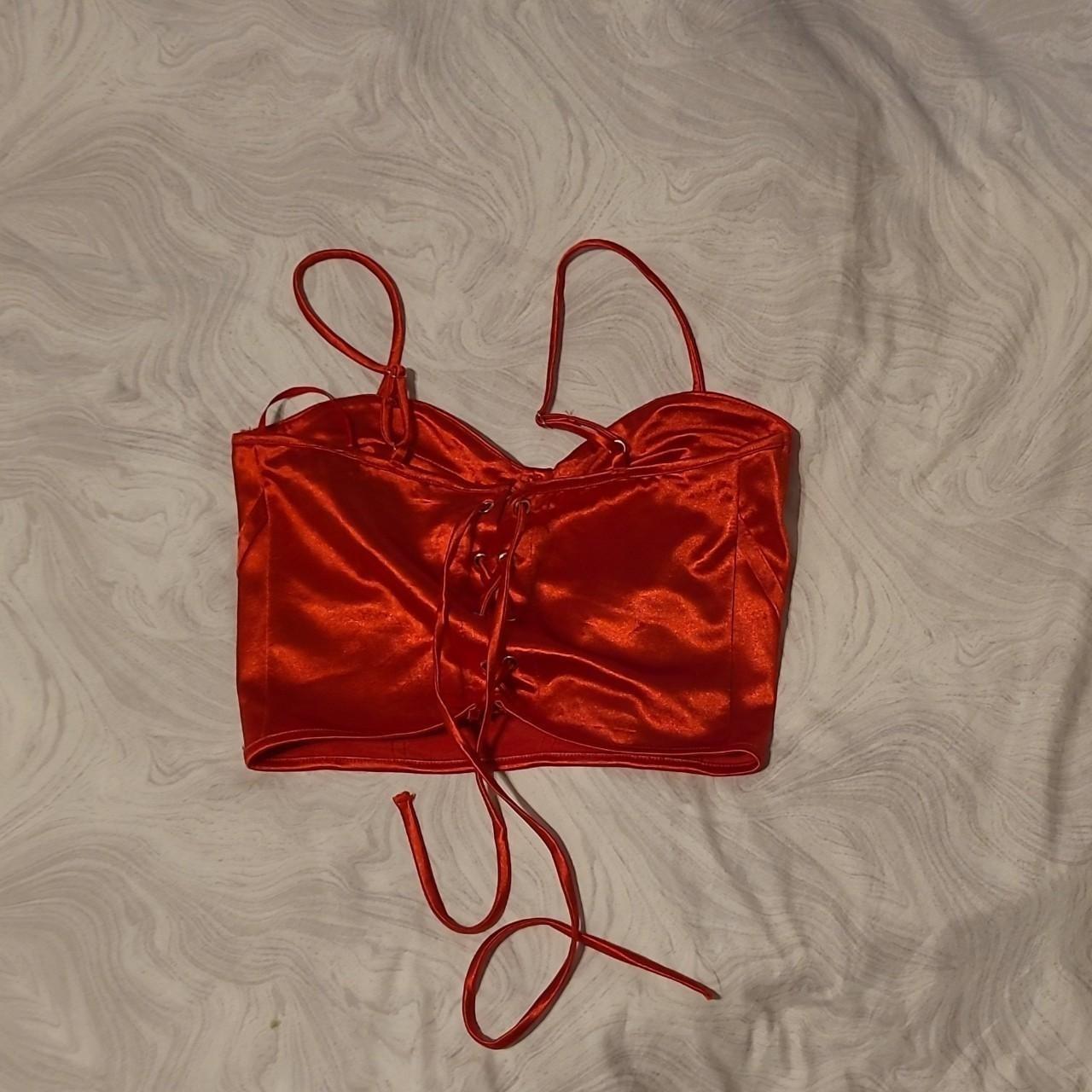 Red tank top with a lace-up corset in the back. - Depop