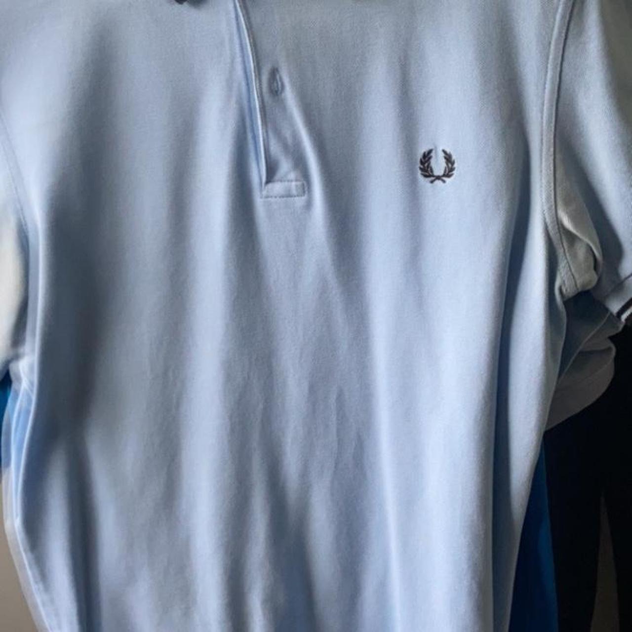 Very smart light blue Fred Perry polo shirt Fits... - Depop