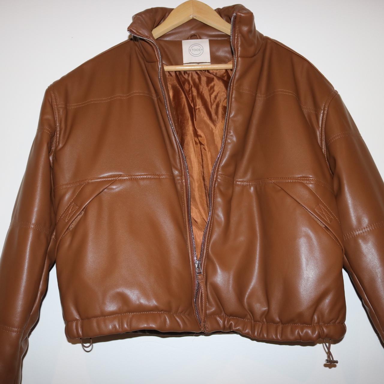 Brown leather puffer jacket. Says size L, more a... | Depop