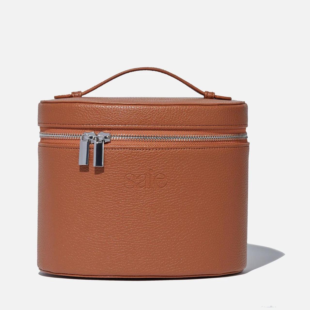 Debating on selling my saie vanity case Lightly... - Depop